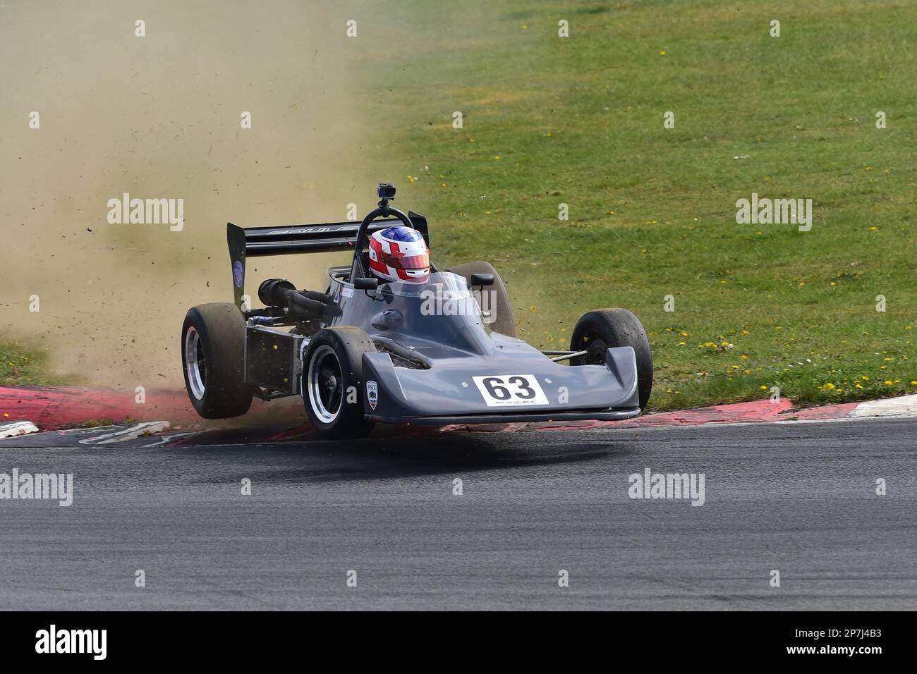 Flying over the kerb at Murrays, Ollie Roberts, Reynard SF79, HSCC ...