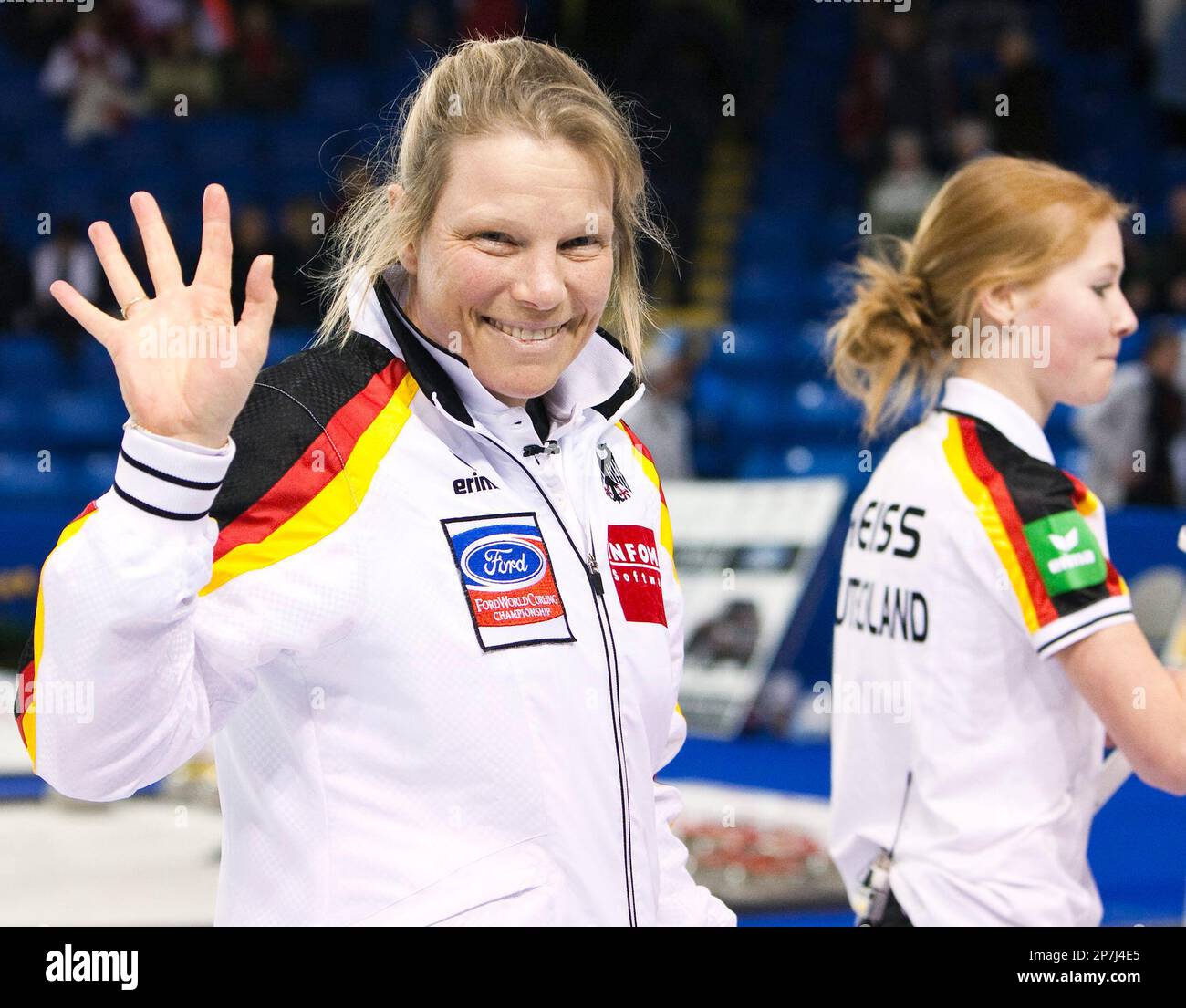 Germany skip Andrea Schopp, left, waves after Germany defeated Canada ...