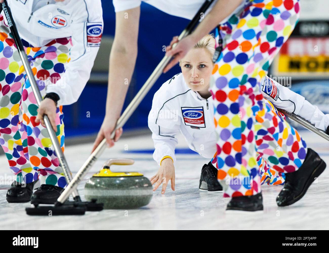Norway skip Linn Githmark, center, watches her rock curl while playing ...