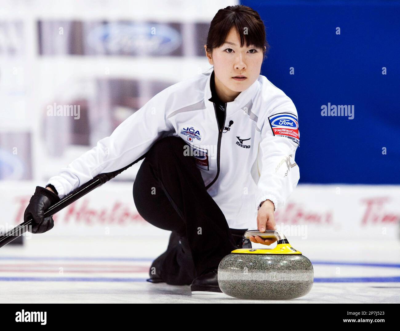 Japan skip Moe Meguro throws her rock while playing against China ...
