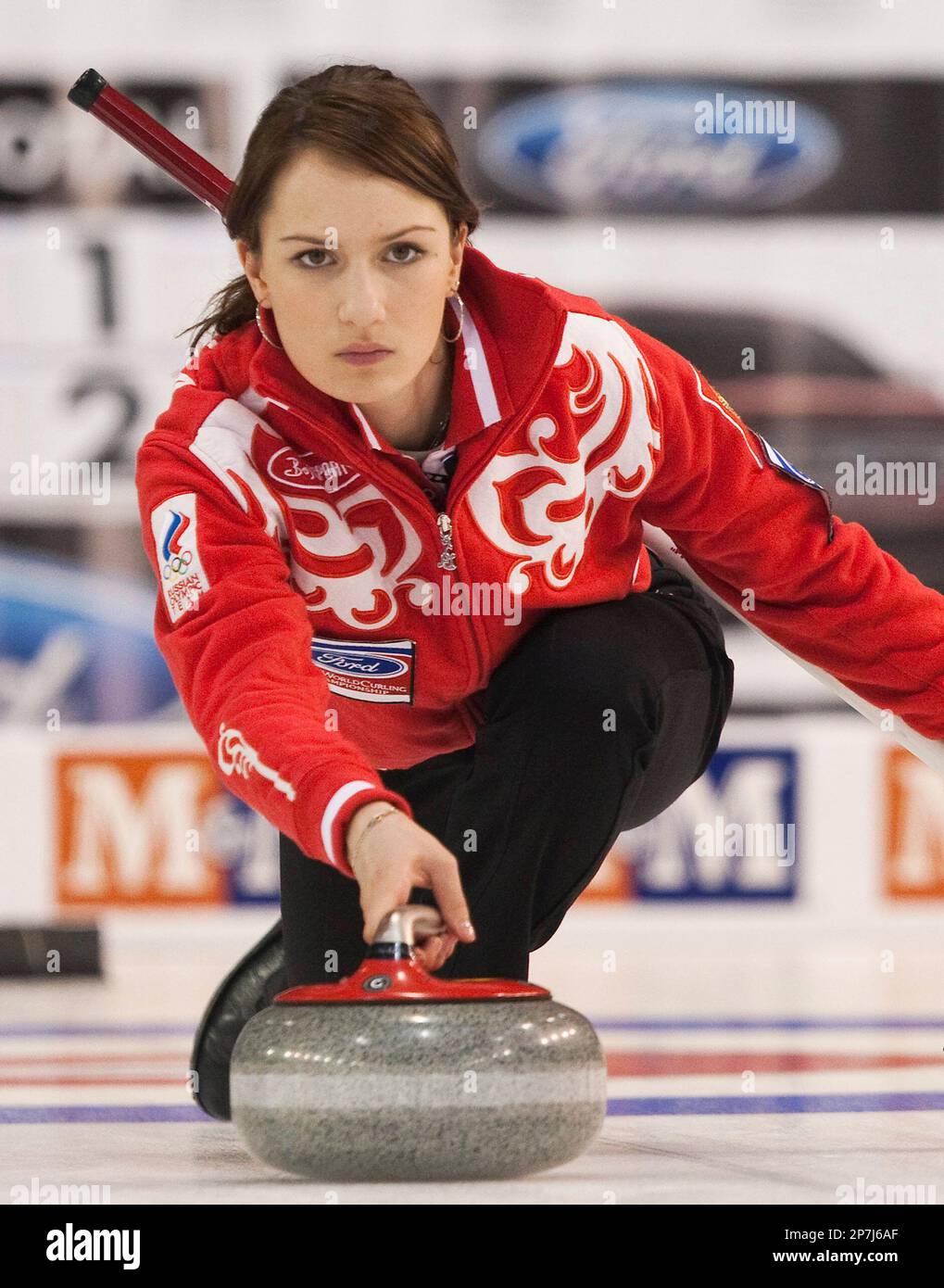 Russia skip Anna Sidorova throws her rock during a match against Japan ...