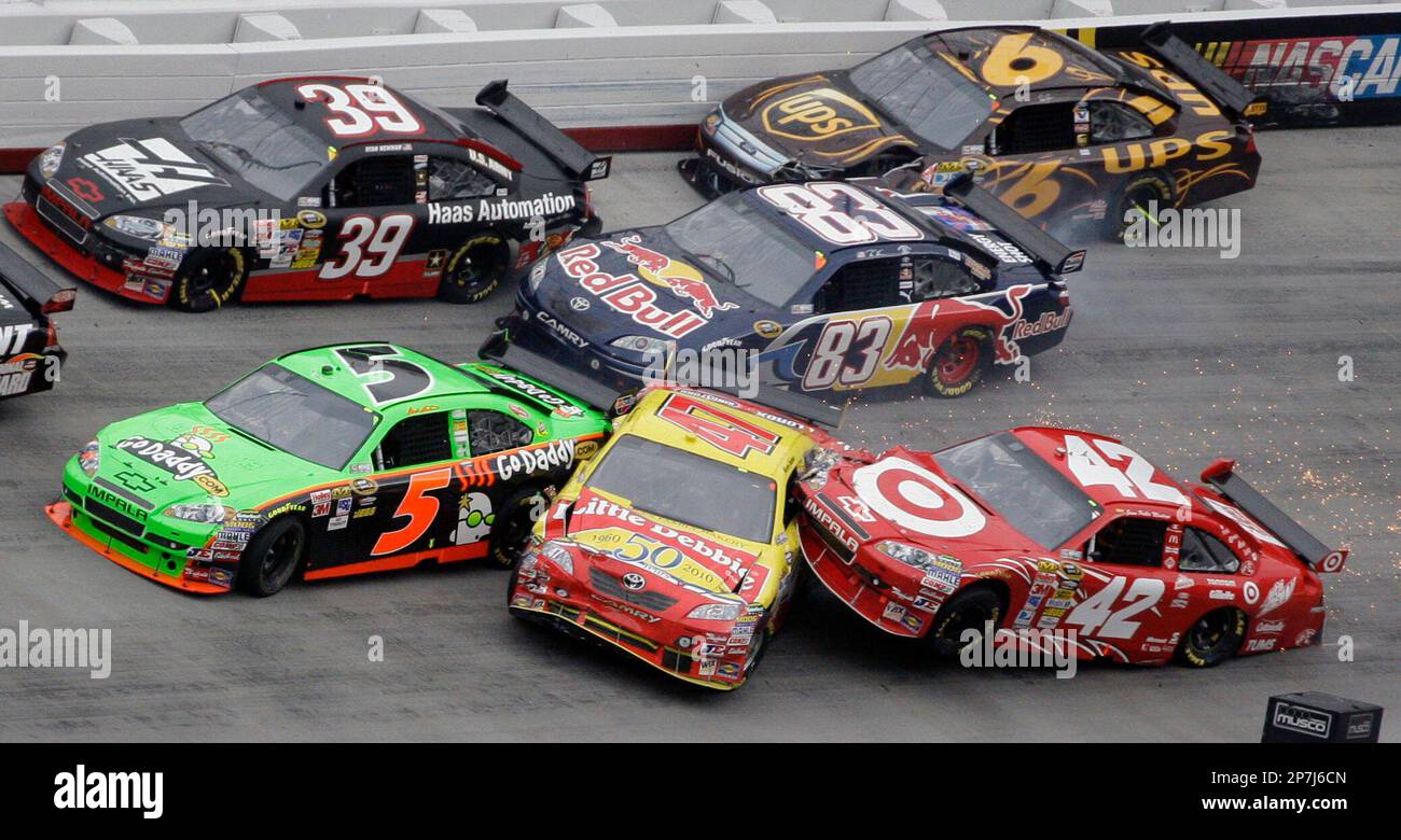 The cars of Mark Martin (5), Marcos Ambrose (47), and Juan Pablo ...