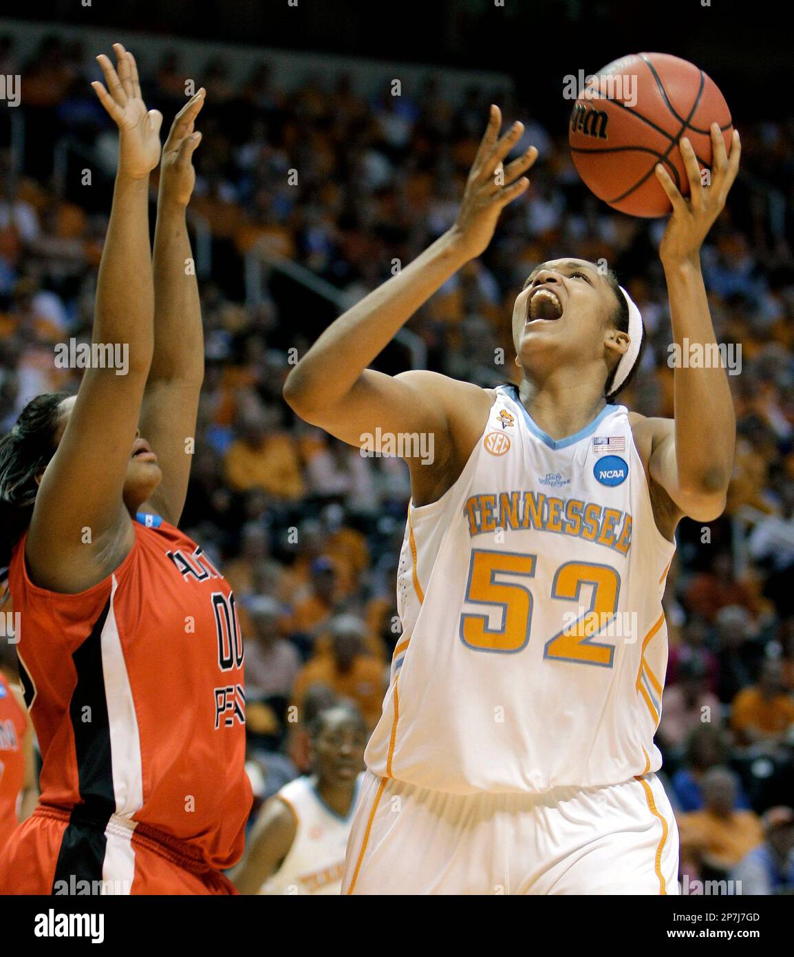 Tennessee center Kelley Cain (52) scores against Austin Peay's Jasmine ...