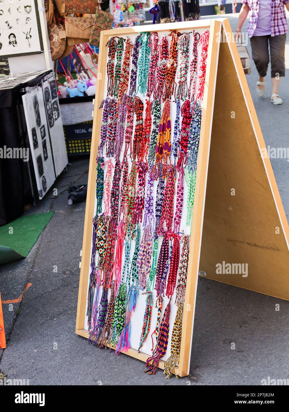 colorful booths and fun rides at a fairground Stock Photo - Alamy