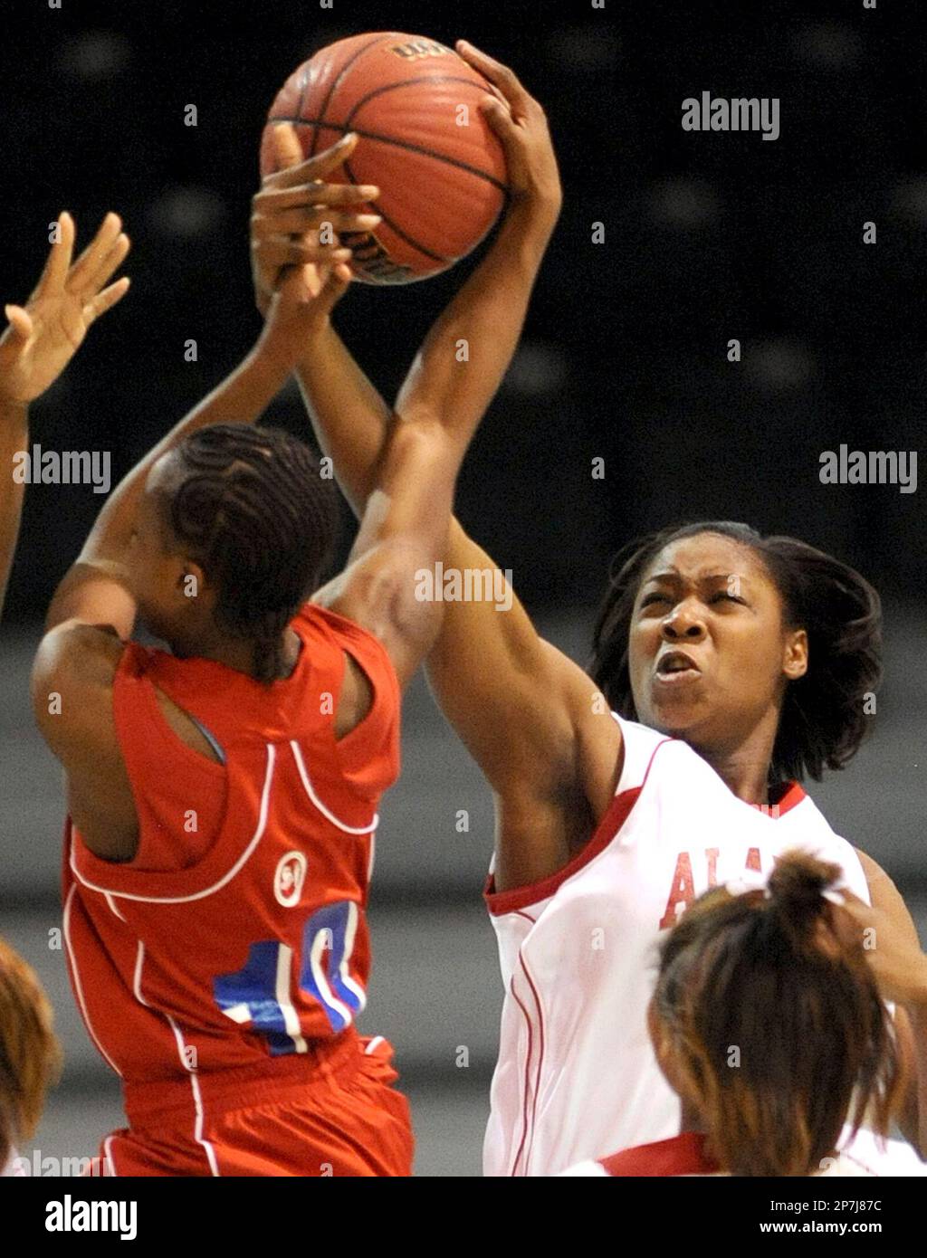 Alabama's Tiffany Stephens (13) blocks a shot by Mississippi's ...
