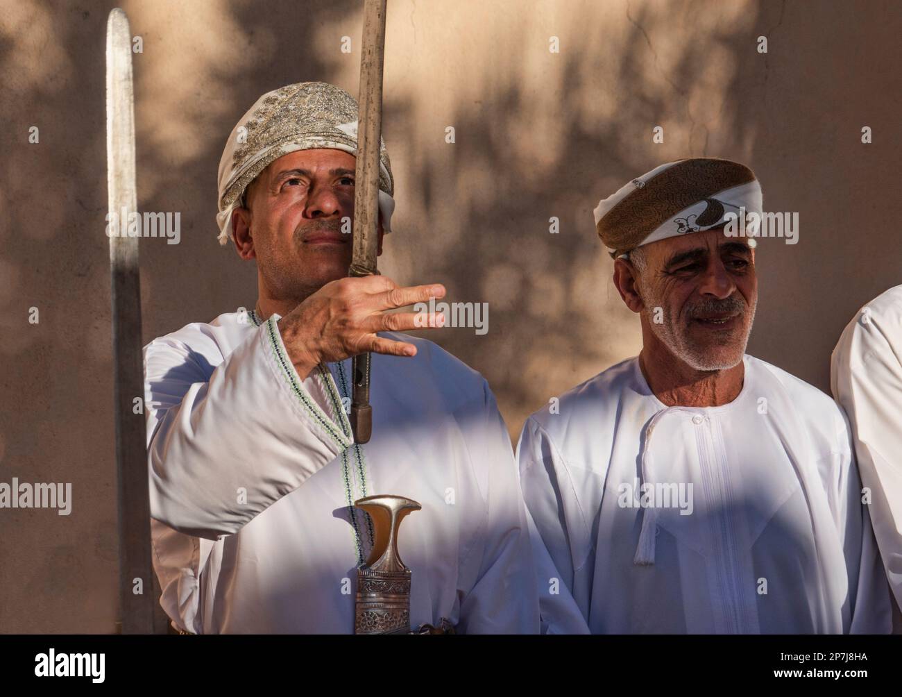 Traditional Omani sword (khanjar) dance, Nizwa, Oman Stock Photo - Alamy