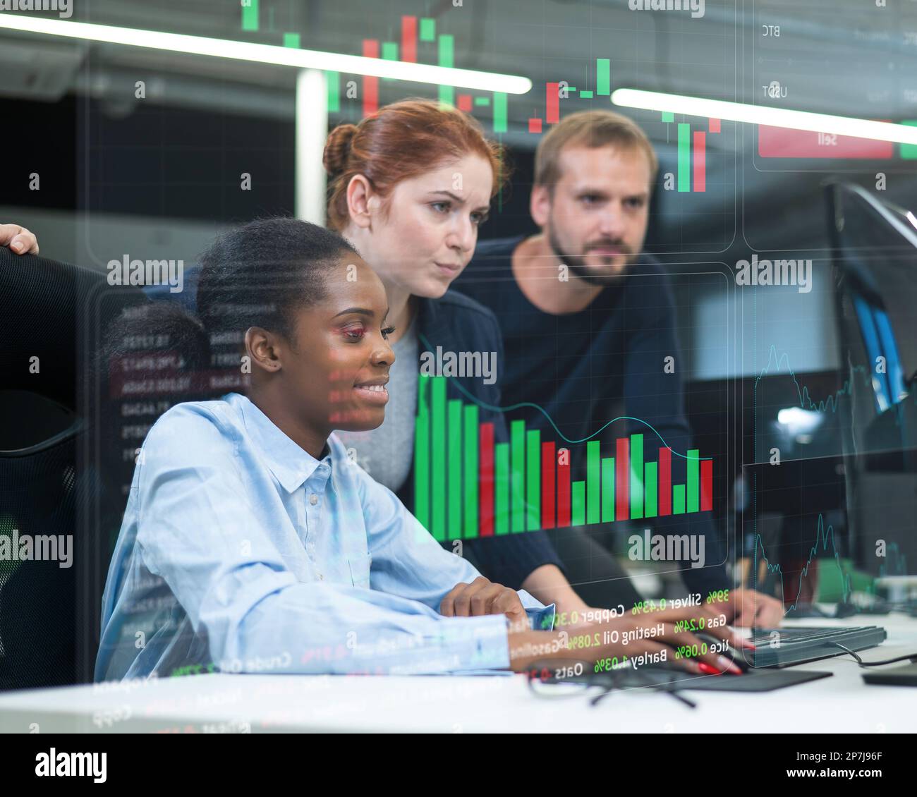 Stock charts on a virtual screen. Colleagues look at the monitor and ...
