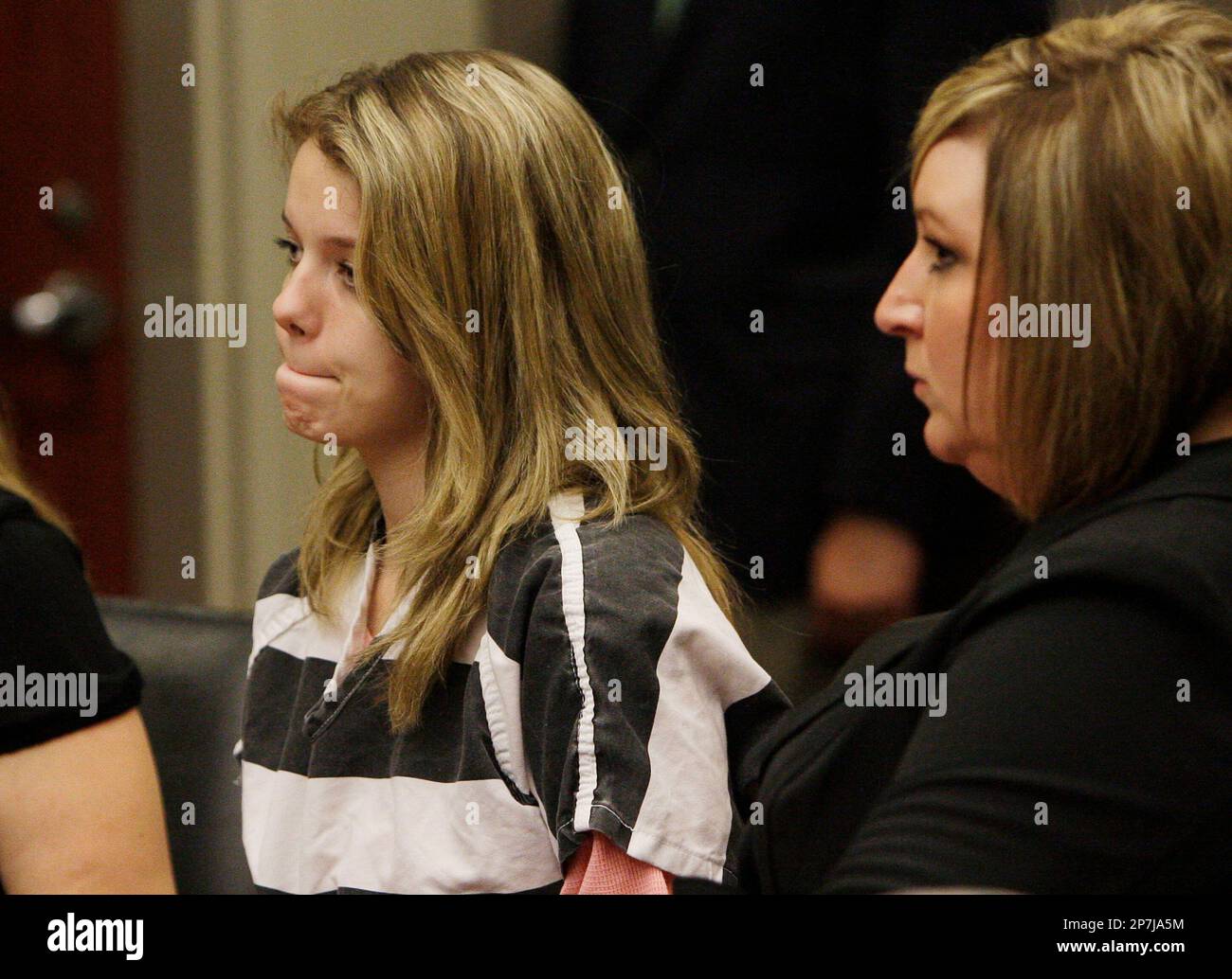 Elizabeth Johnson, left, mother of missing baby Gabriel, reacts to ...