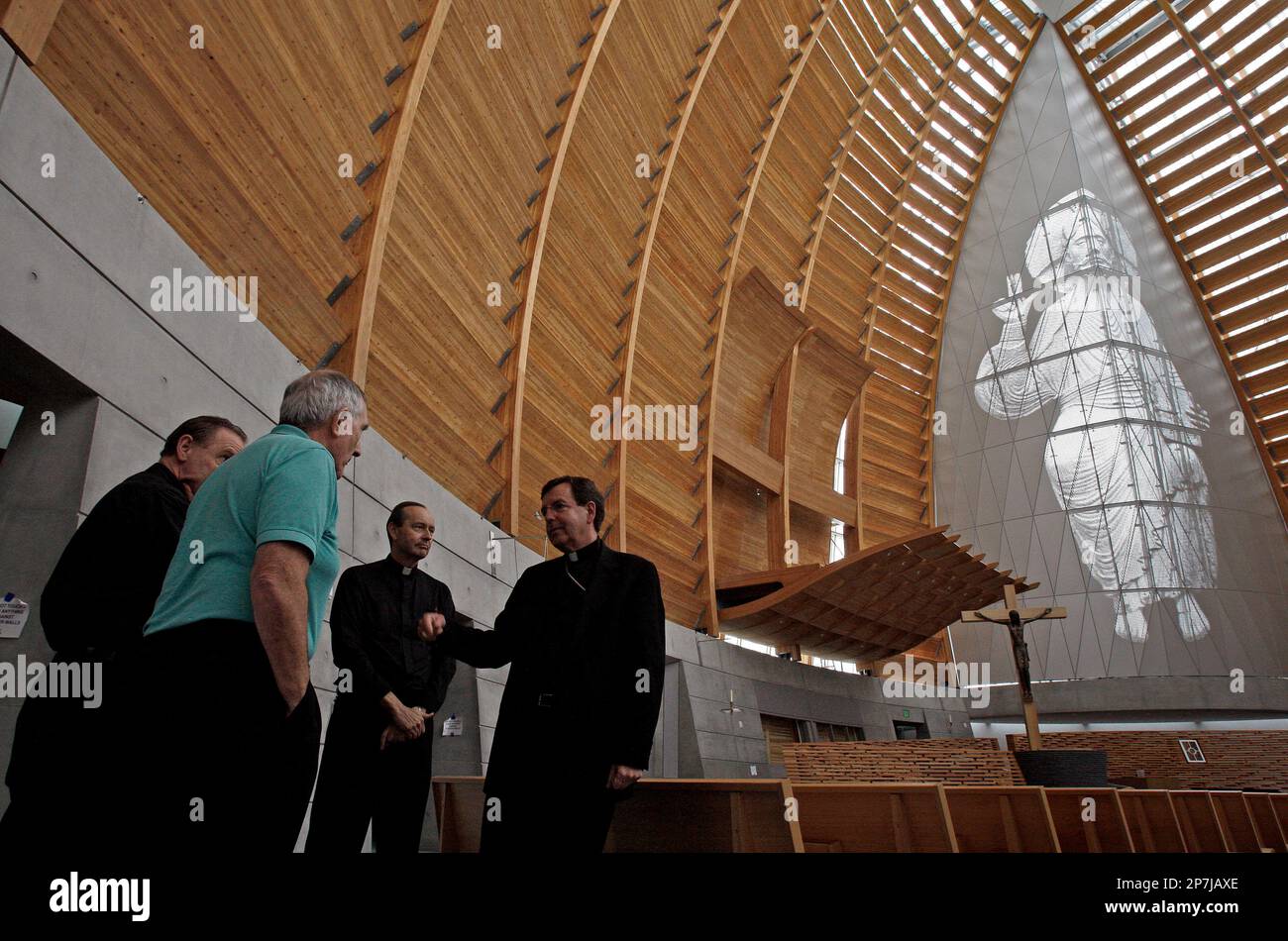 Catholic clergy touring the newly built Cathedral of Christ the light ...