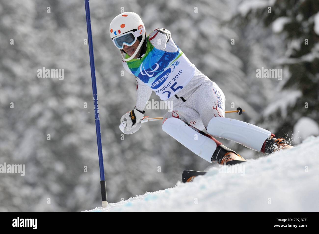France's Vincent Gauthier-Manuel passes a gate during the first run of ...