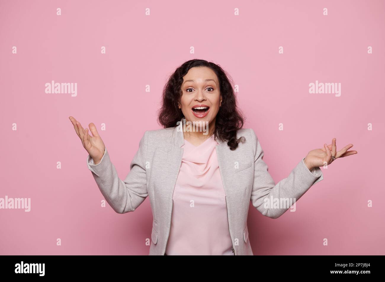 Isolated portrait on pink background of pretty woman, gesturing with ...