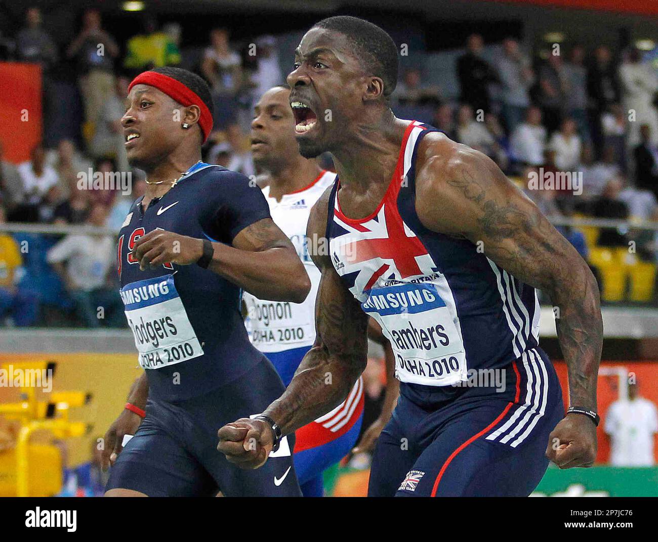 Britain's Dwain Chambers celebrates after winning the gold medal in the ...