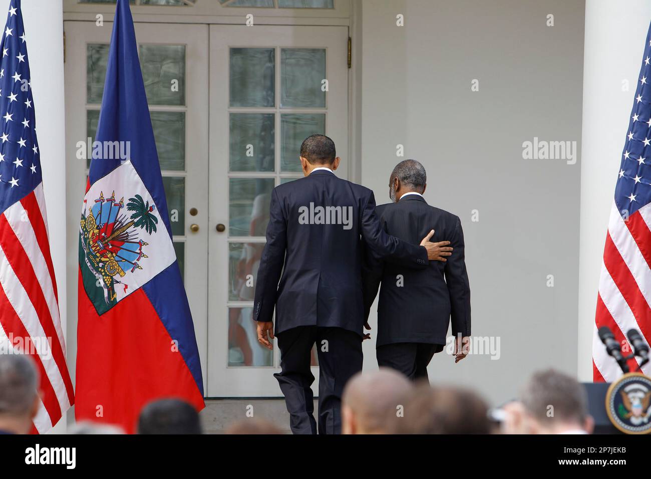 President Barack Obama puts his arm around Haitian President Rene ...