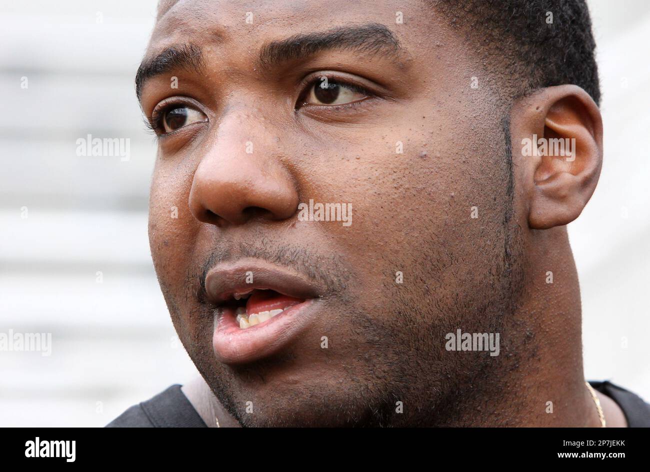 Former Oklahoma State football player Russell Okung talks to reporters ...