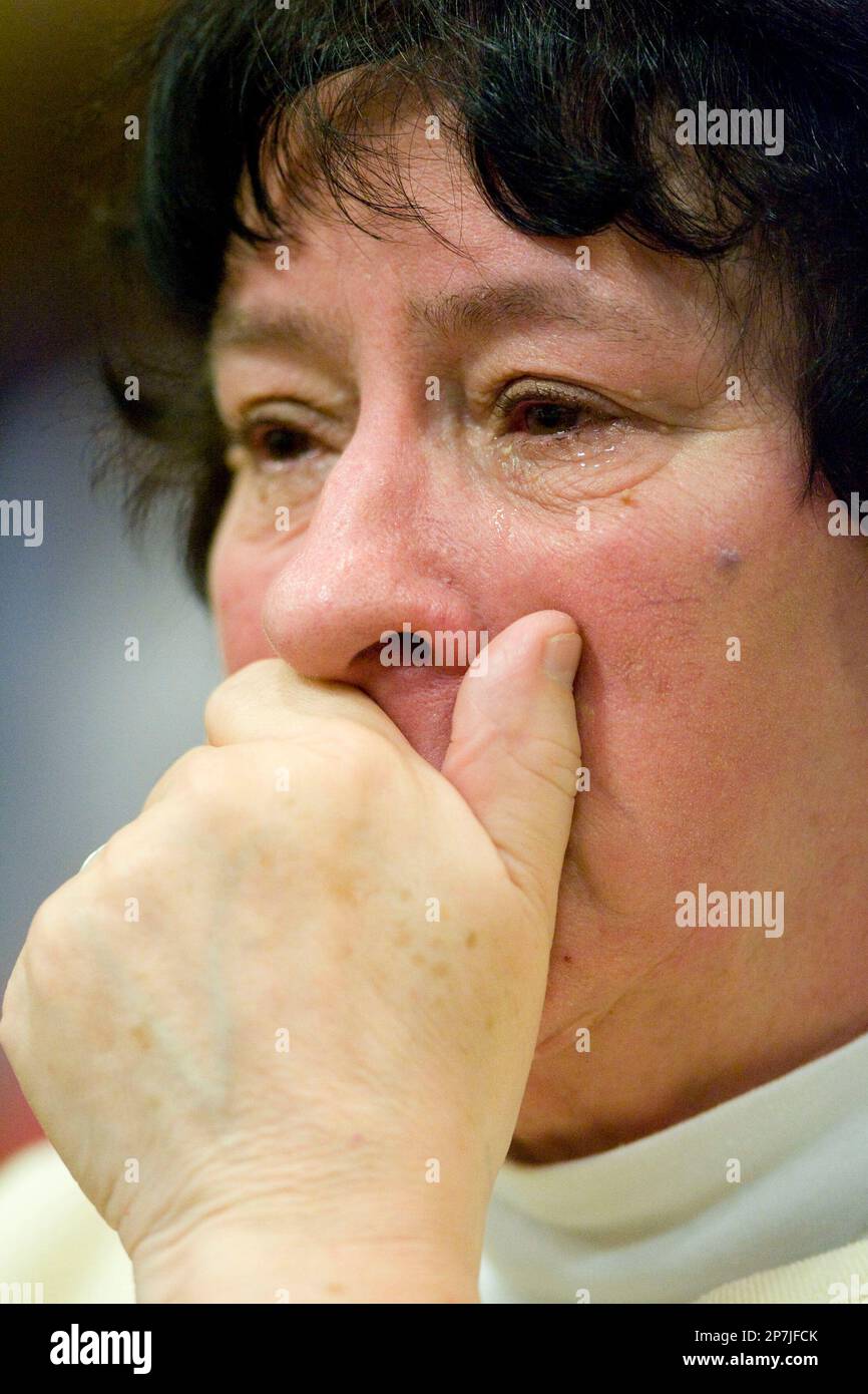 Barbara Wing, mother of Kelly Wing Schmidt, cries while listening to ...