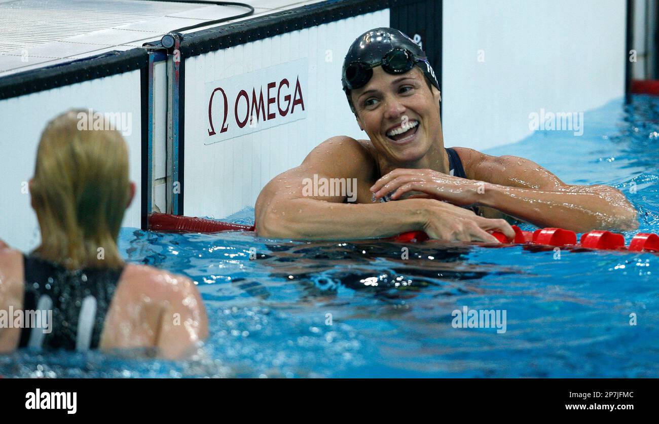 USA's Dara Torres smiles at Gold medal winner Britta Steffan of Germany ...