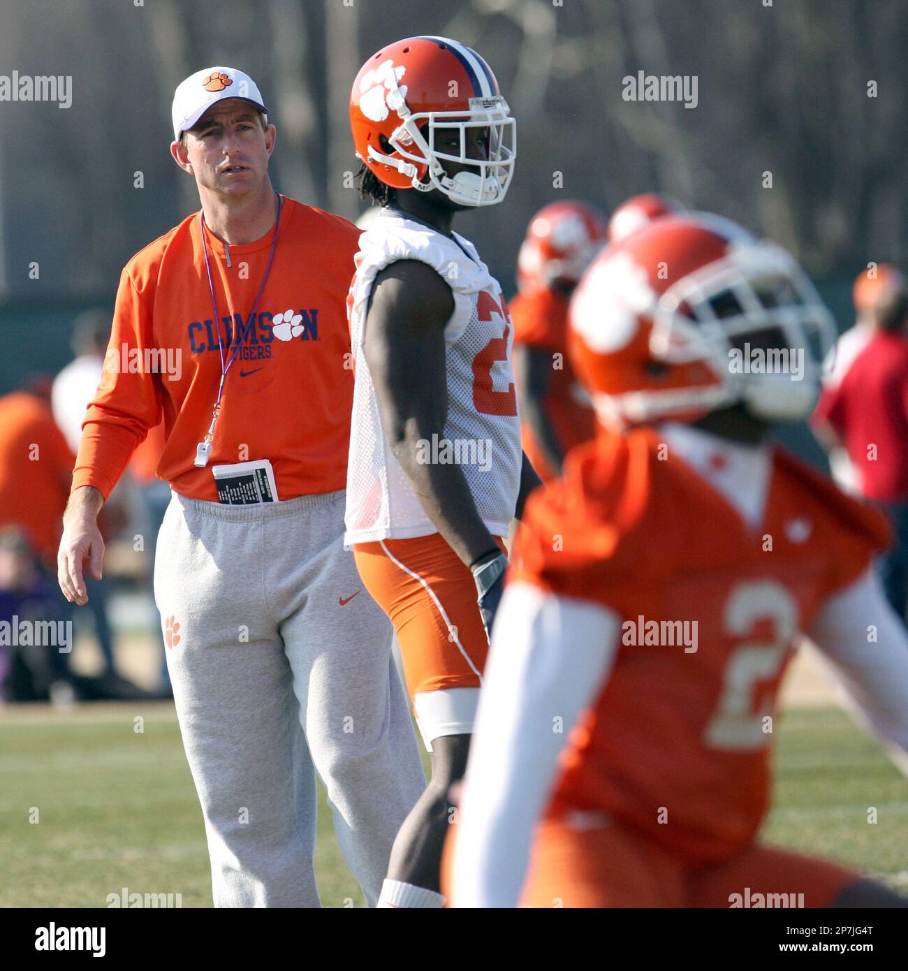 Clemson football coach Dabo Swinney, left, watches Andre Ellington ...