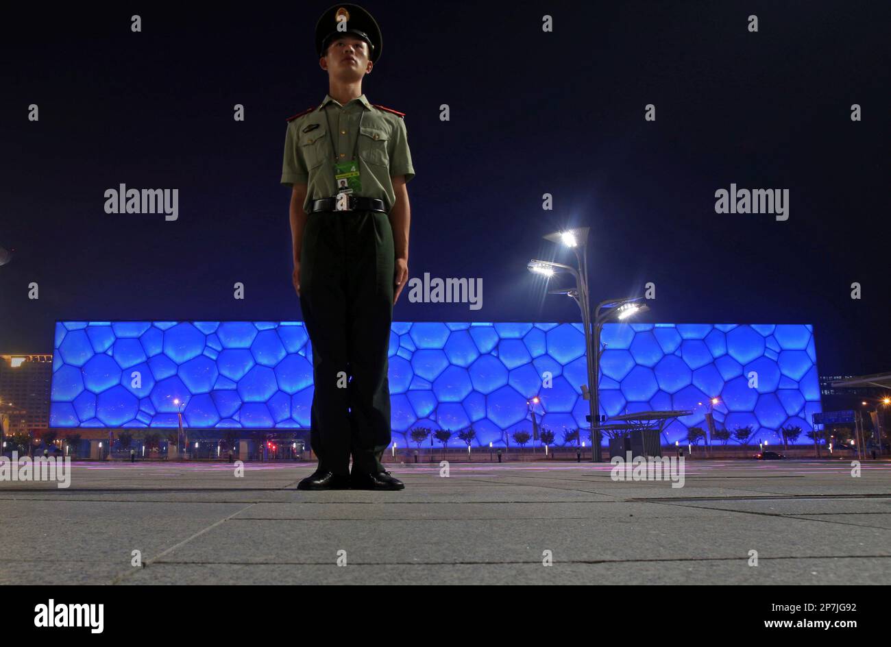A Beijing Police Officer on guard at the Olympic Green as the city ...