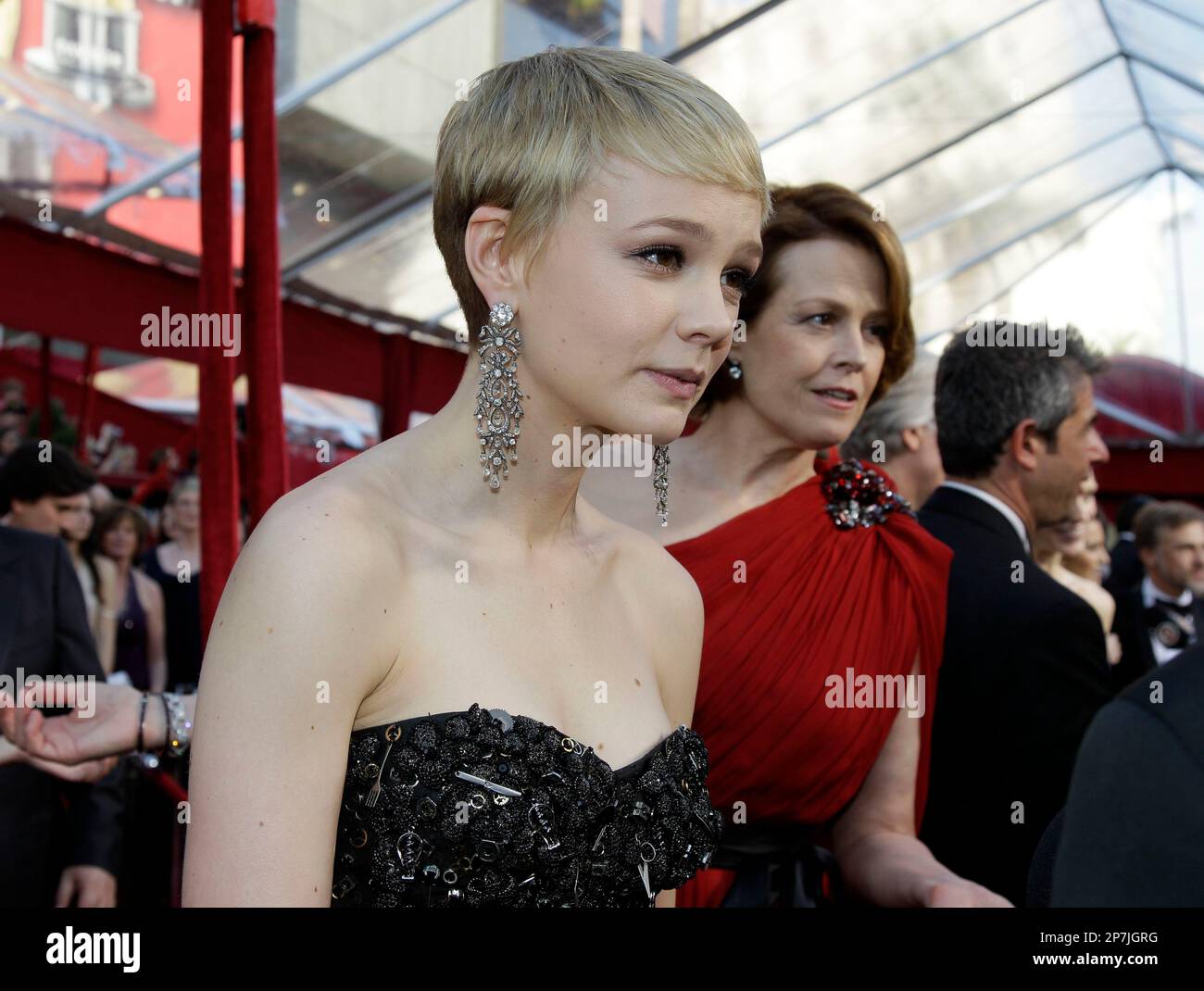 Best Actress nominee Carey Mulligan and Sigourney Weaver arrive at the ...
