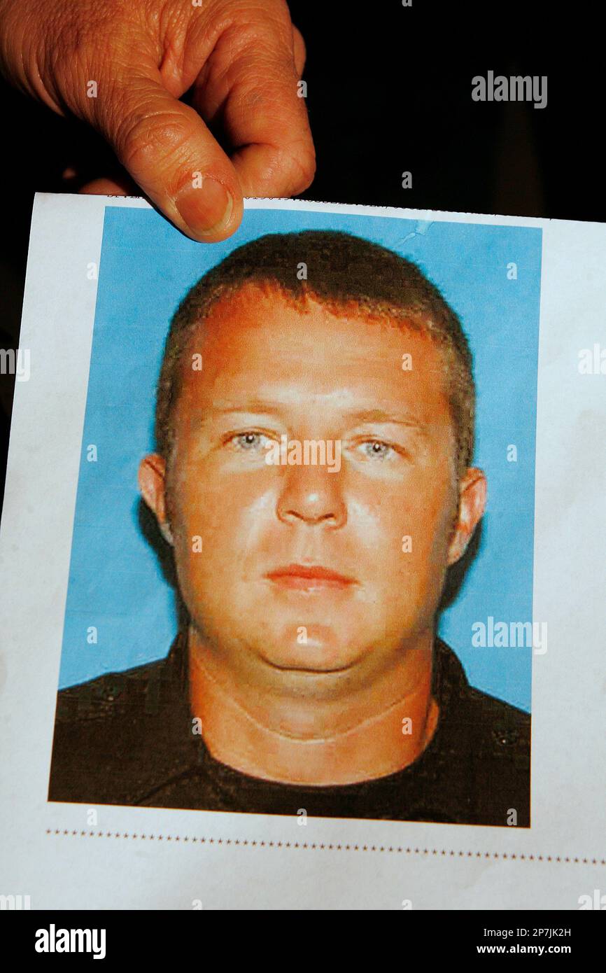 Ouachita Parish Sheriff Royce Toney, holds a picture of sheriff's ...
