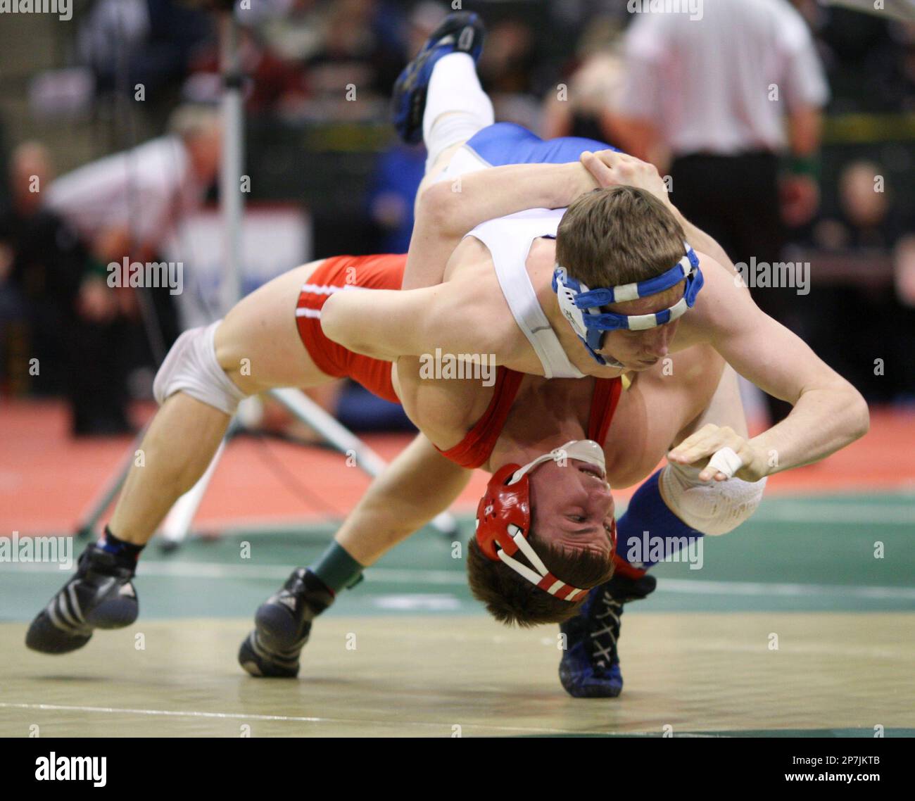 Nick Tourville of Benilde-St. Margaret's throws down Colin McCarty of ...