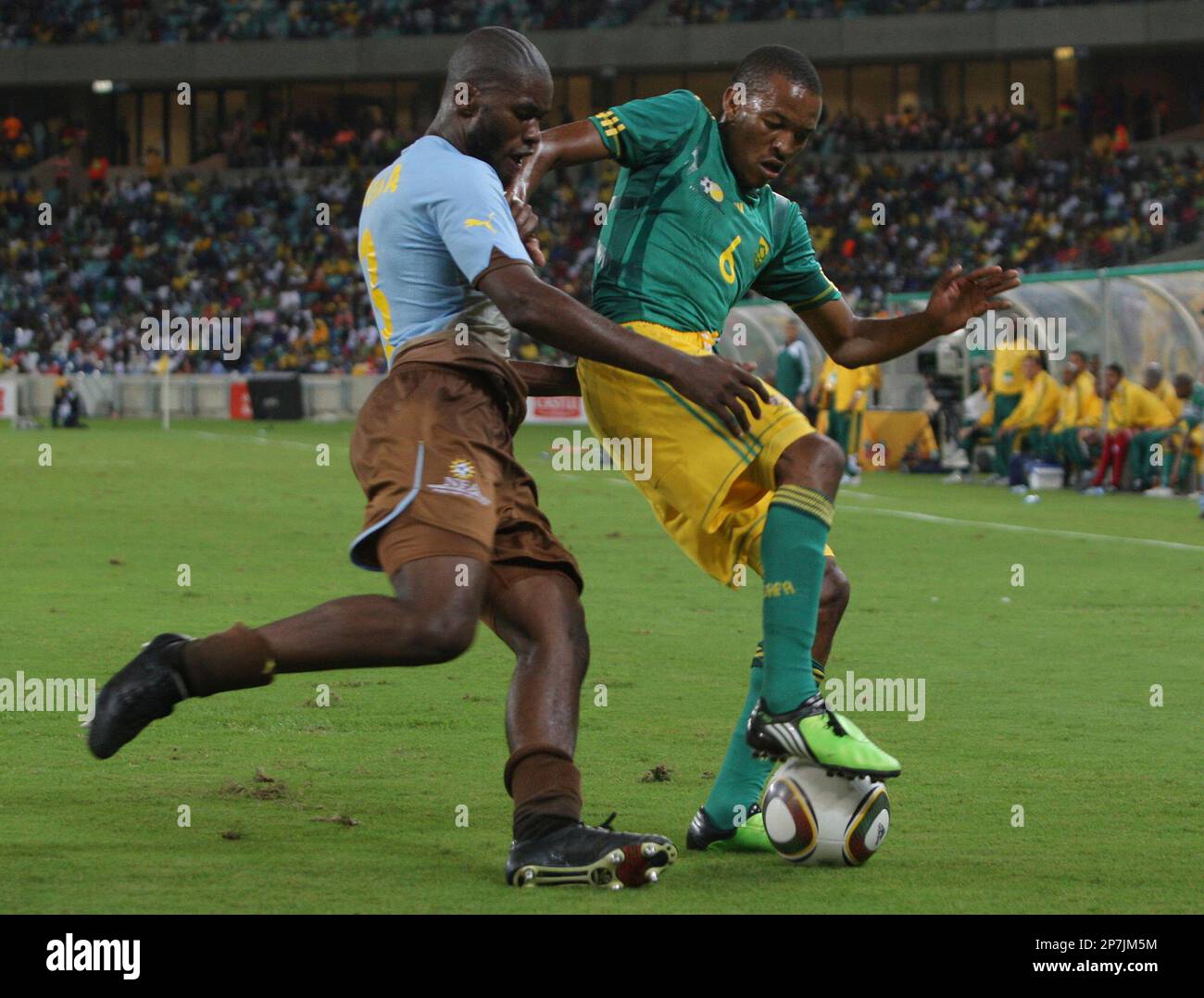 South Africa's Tlou Segolela, right, battles for possession of the ball ...