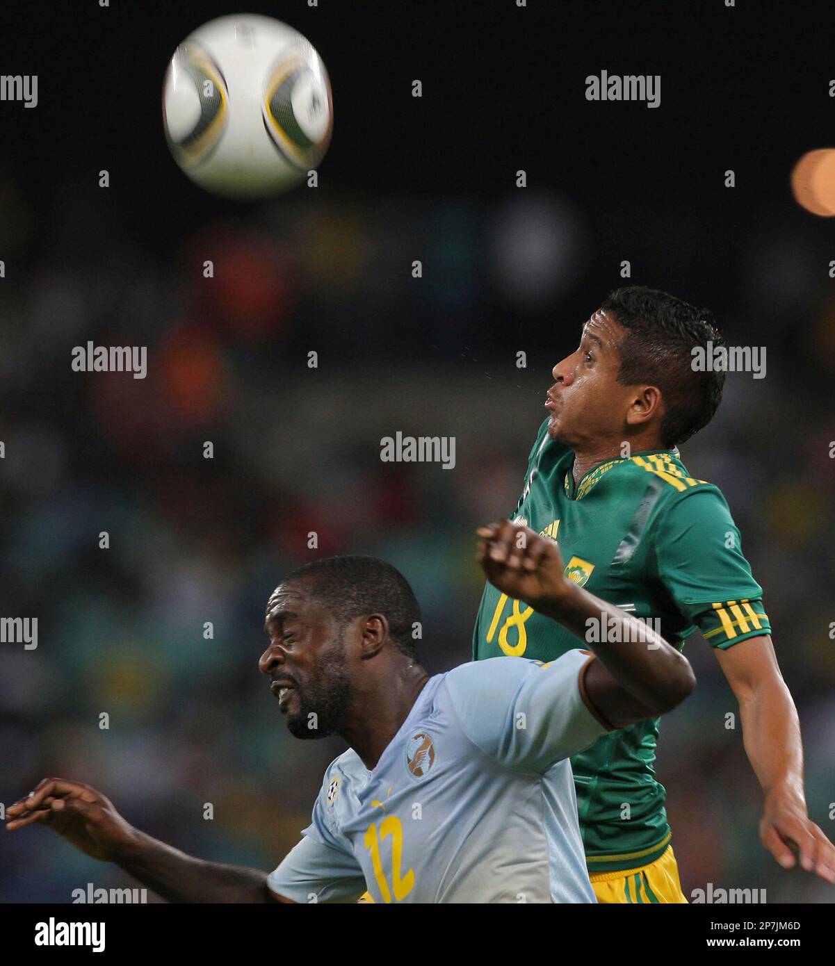 South Africa's Daine Klate, back, battles for the ball from Namibia's ...