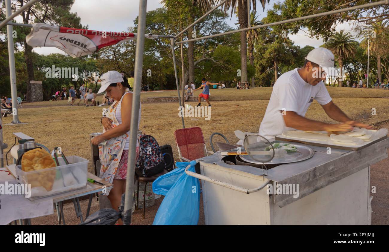 Visitors enjoying fried snacks at a funfair in Montevideo,Uruguay Stock ...