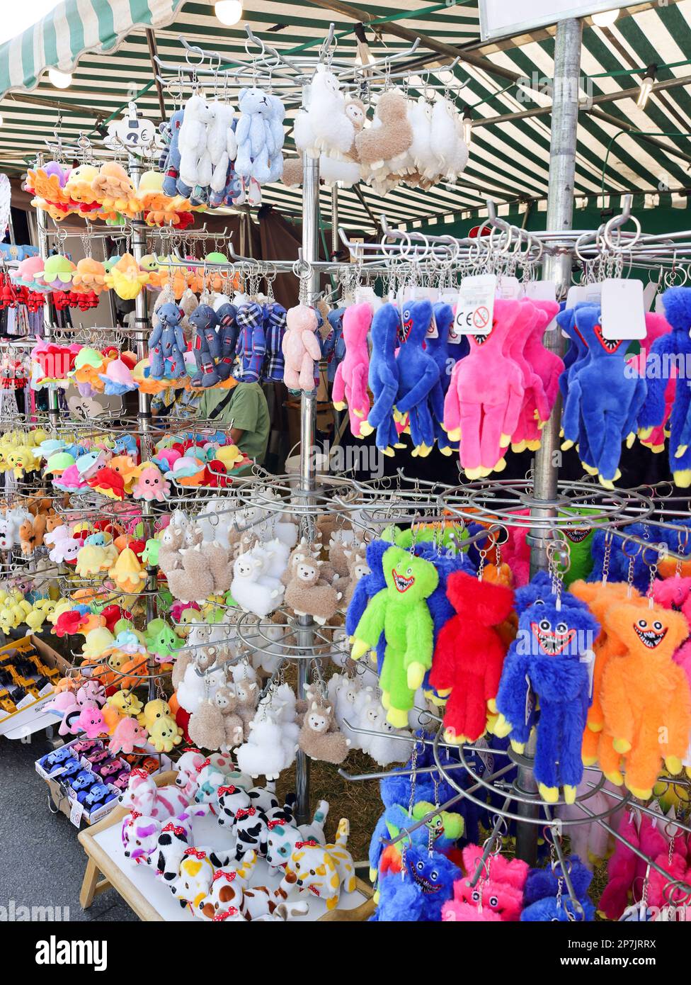 colorful booths and fun rides at a fairground Stock Photo - Alamy