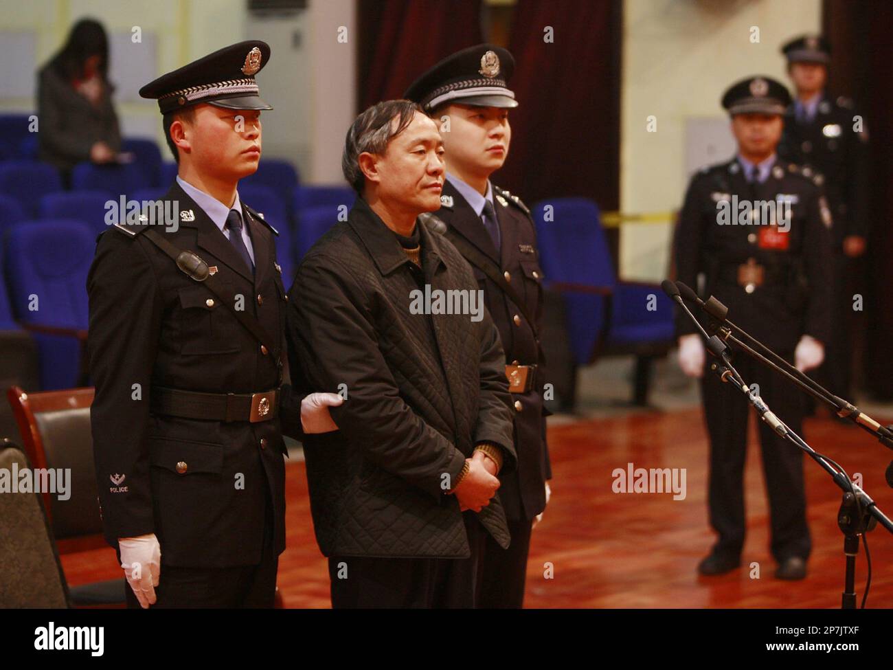 Chen Honggang, former head of Chongqing's traffic police, stands his ...