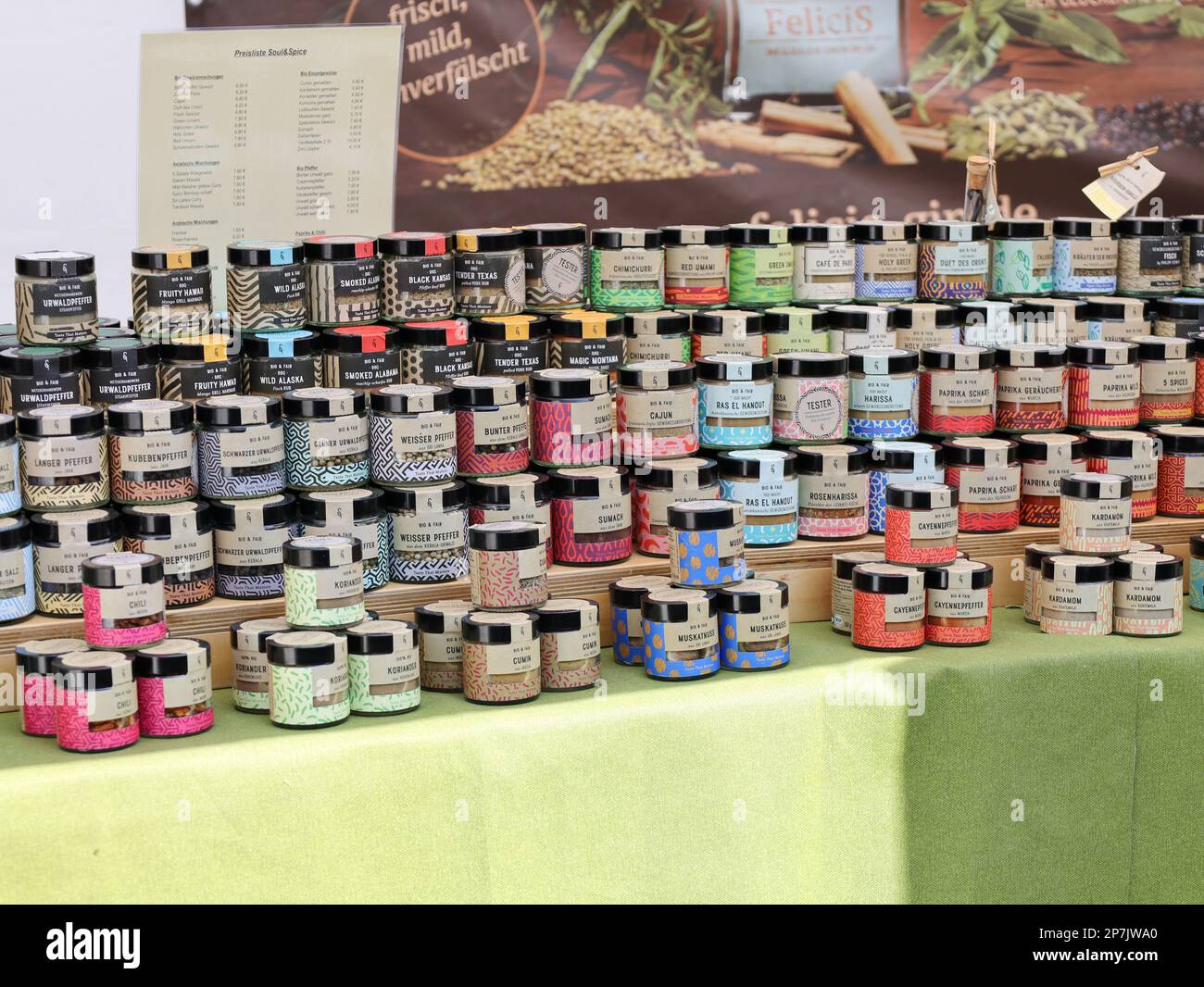 colorful booths and fun rides at a fairground Stock Photo - Alamy