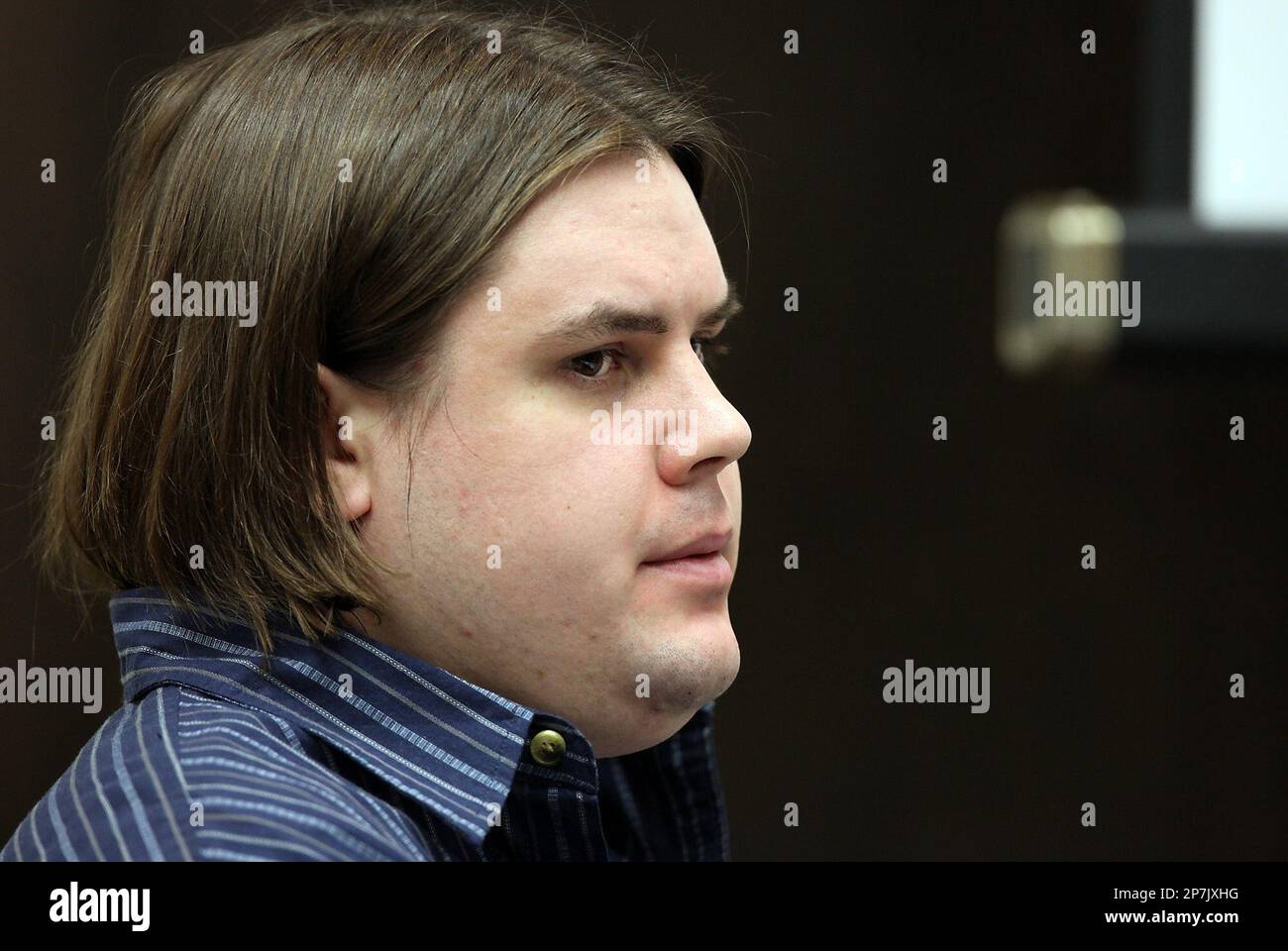 Mark Becker listens to testimony in his first-degree murder trial at ...