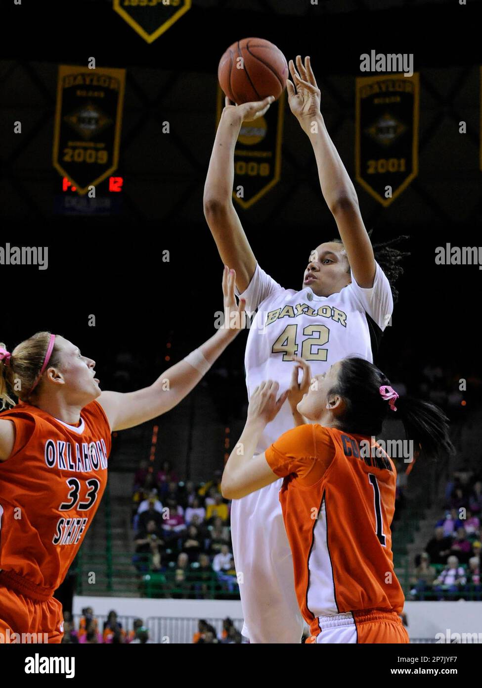 Baylor's Brittney Griner (42) shoots over Oklahoma State's Megan Byford ...