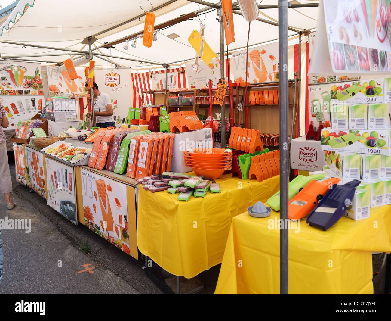 colorful booths and fun rides at a fairground Stock Photo - Alamy