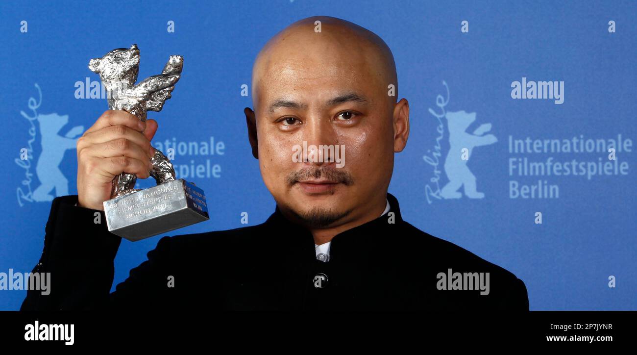 Director Wang Quan'an holds his Silver Bear award for the movie "Tuan ...