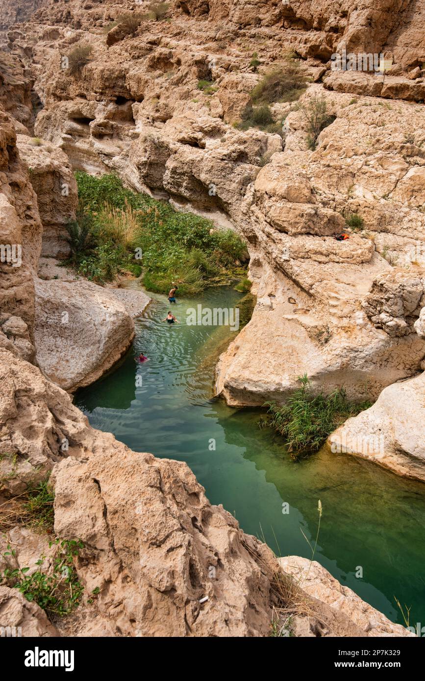 Turquoise water flowing through the Wadi Shab canyon, Wadi Ash Shab ...