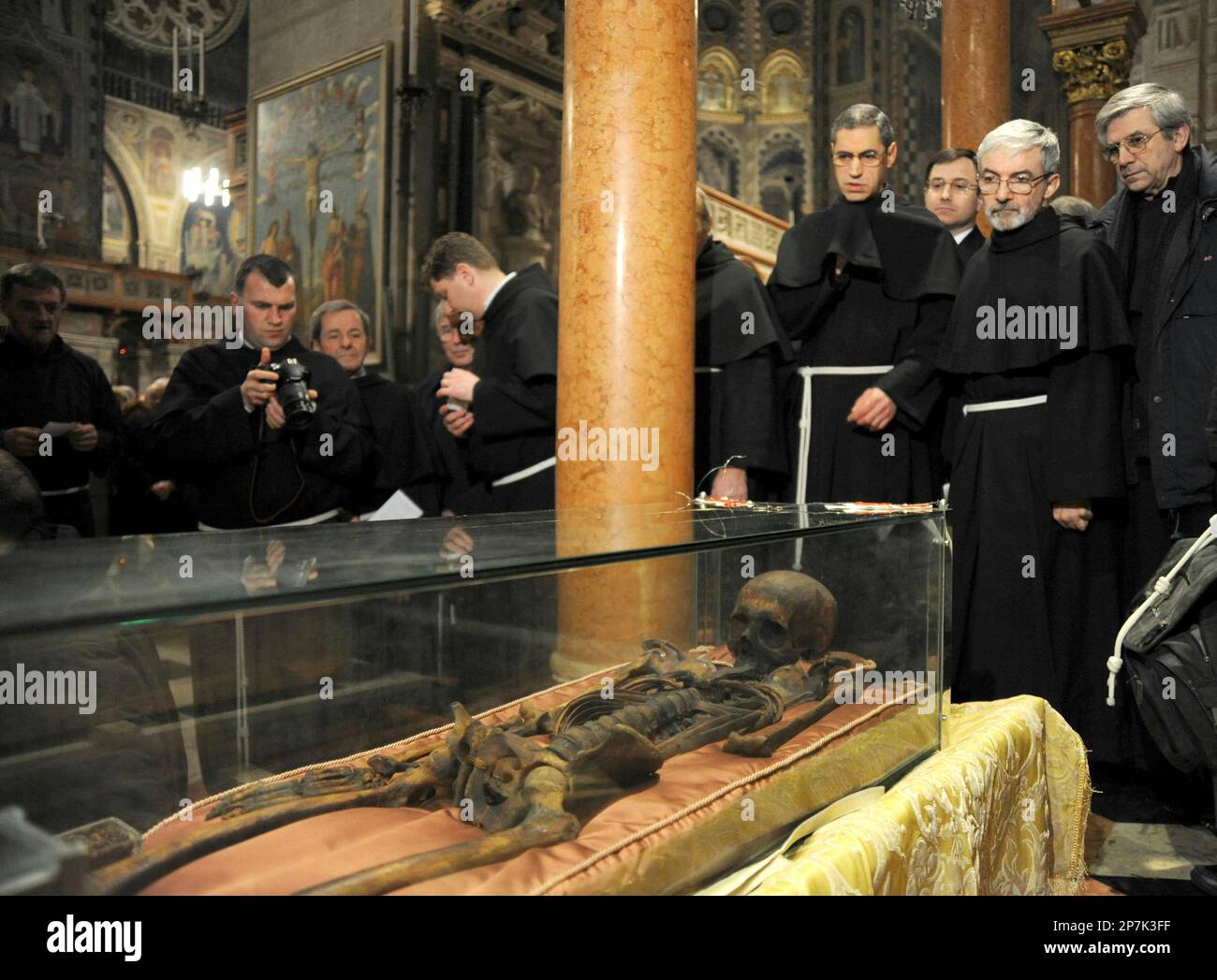 Monks look at the skeleton of Portuguese St. Anthony put on display for ...