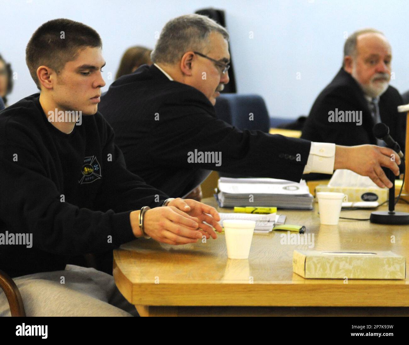 Jason Abbott, left, reaches for a cup of water during his sentencing ...