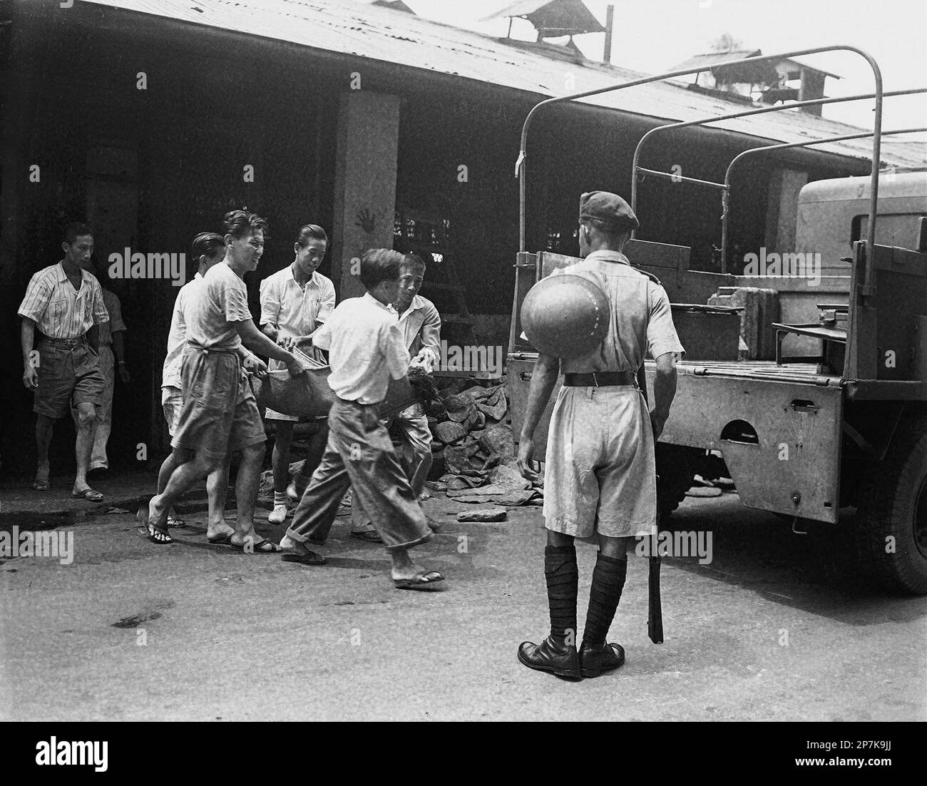 Rioters killed a Chinese rubber worker and injured two others at the ...