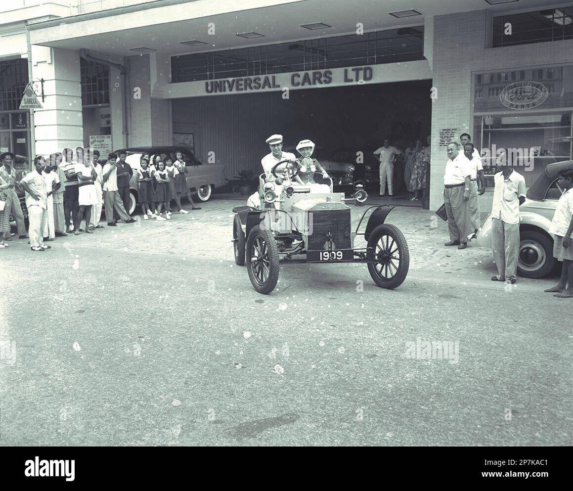 A Cathay cinema usherette, Miss Nancy Tan, went for a short ride in the ...