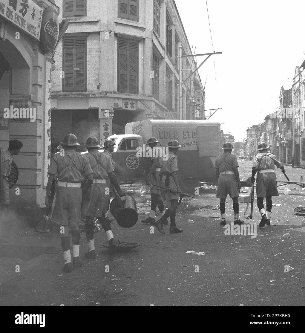 There were pitched battles all over Singapore as rioters and police ...