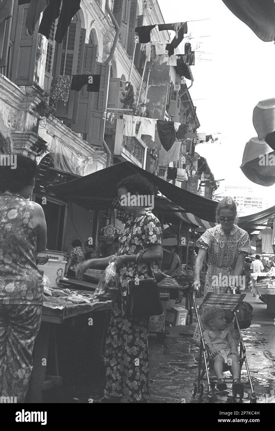 Women in "samfoo" doing their marketing in old Chinatown amidst pre-war ...