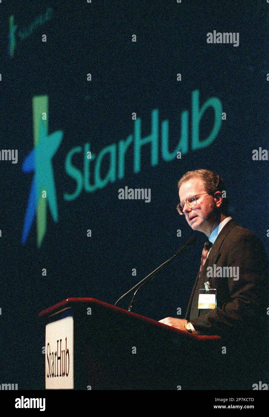 Mr Terry Clontz, CEO of StarHub, delivering his speech during the ...