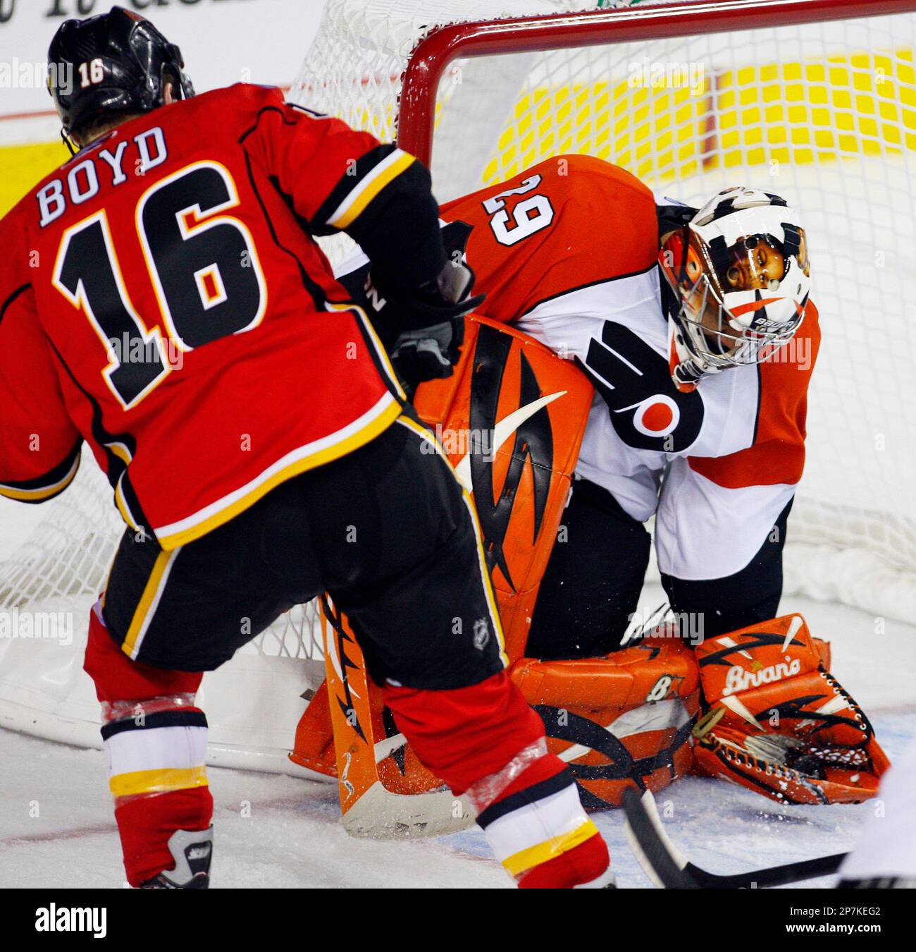 Philadelphia Flyers goalie Ray Emery, right, makes a gloves save on a ...