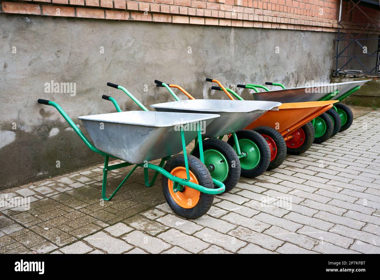 Wheelbarrows is small hand-propelled vehicle Stock Photo - Alamy Wheelbarrows is small hand-propelled vehicle Stock Photo - Alamy