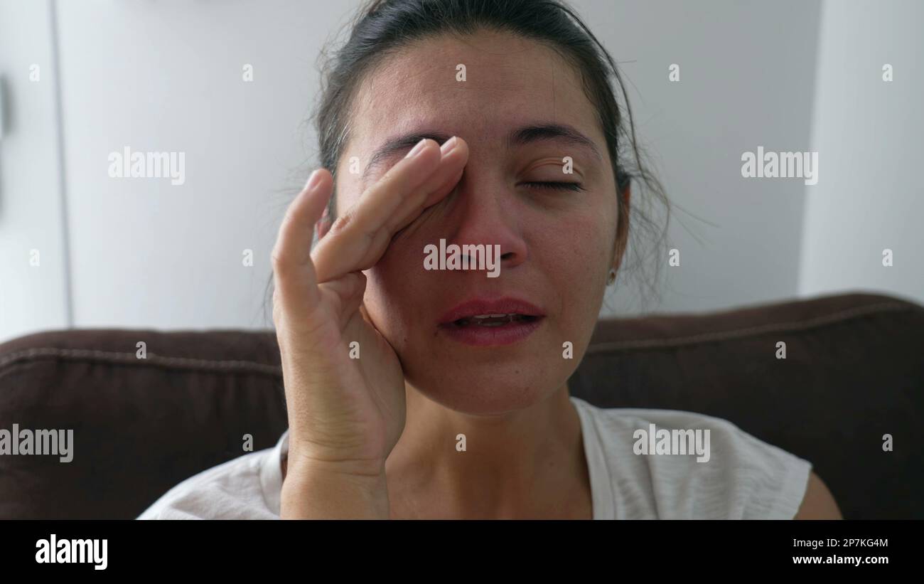 Sad woman taking a deep breath feeling anxious. Crying female person ...