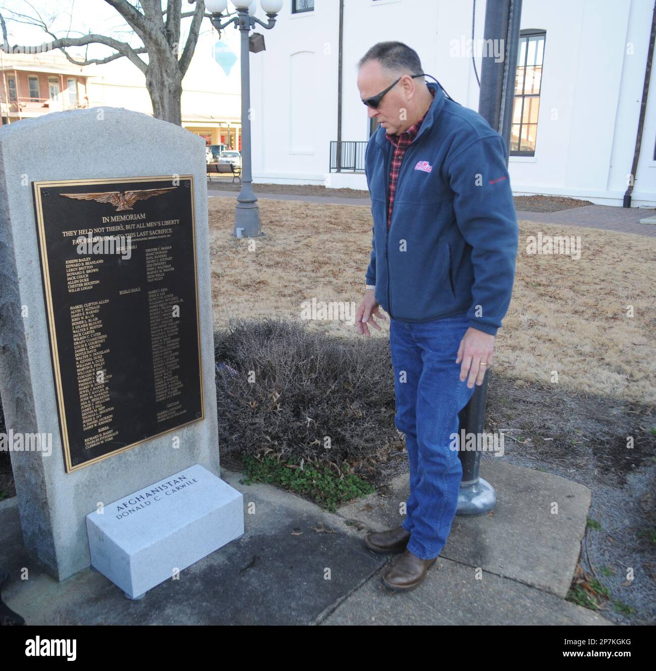 In a Wednesday, January 27, 2010 photo, Dennis Carwile looks at a ...