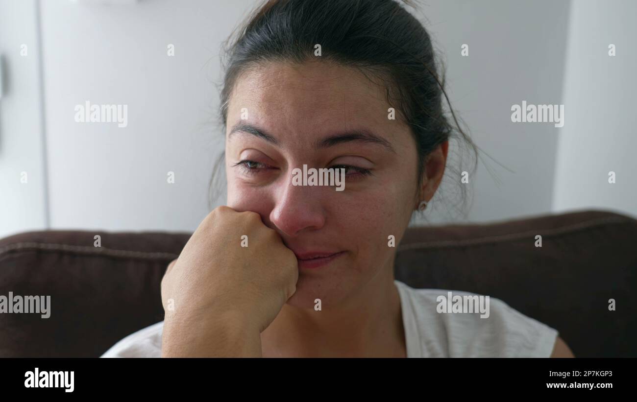 Sad woman taking a deep breath feeling anxious. Crying female person ...