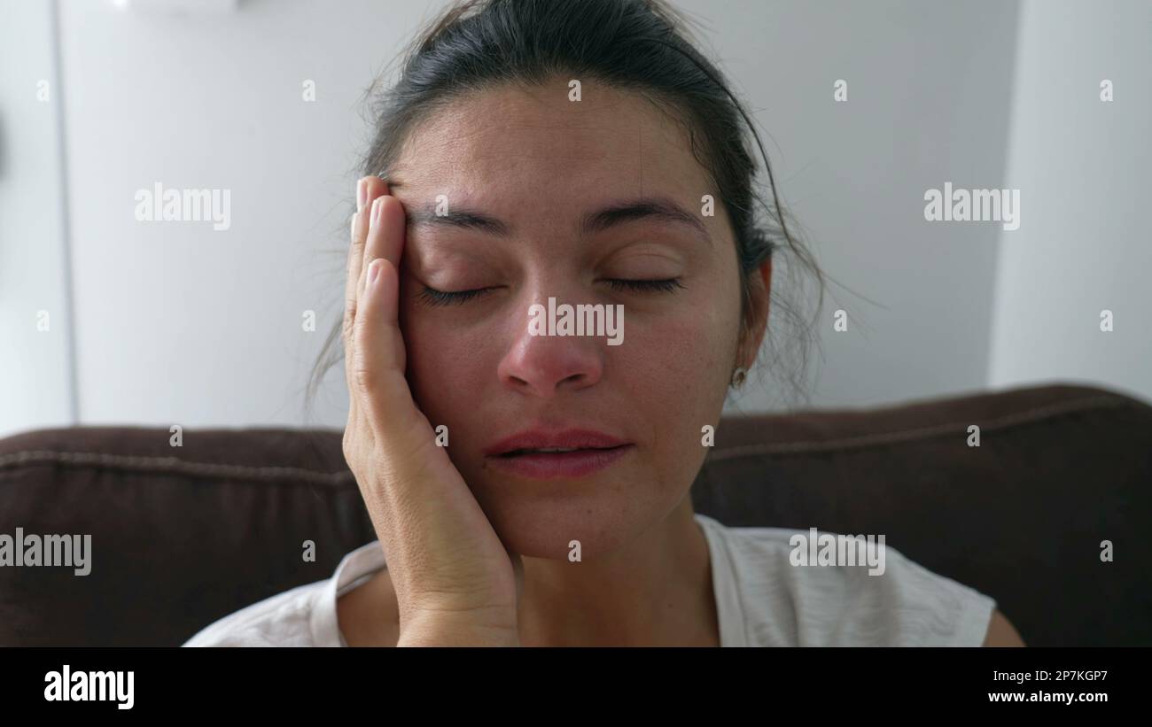 Sad woman taking a deep breath feeling anxious. Crying female person ...