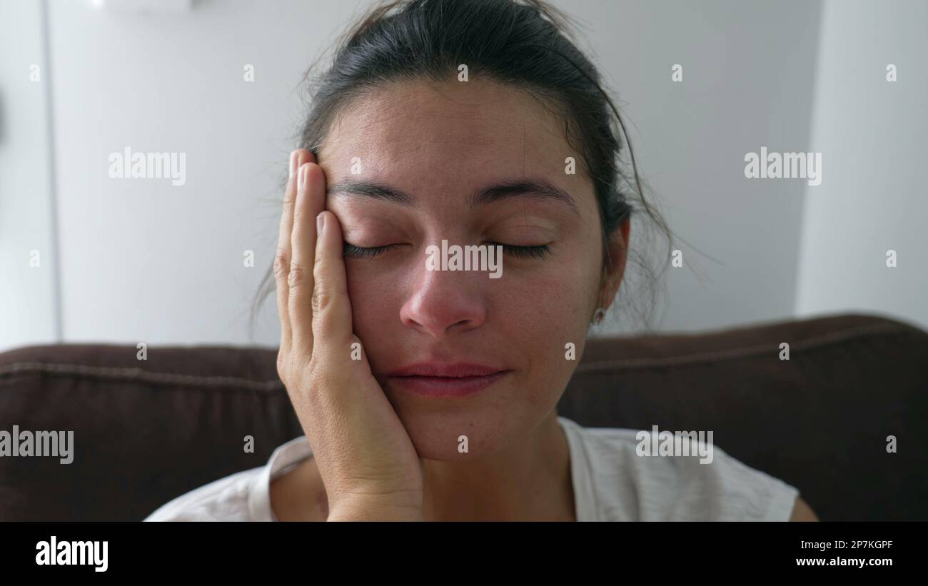 Sad woman taking a deep breath feeling anxious. Crying female person ...